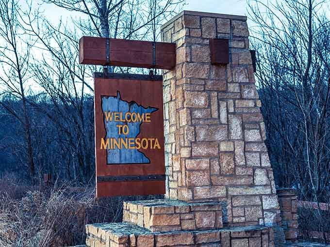 Another welcome sign joins the party, because apparently one geographical joke just wasn't quite enough for this place.