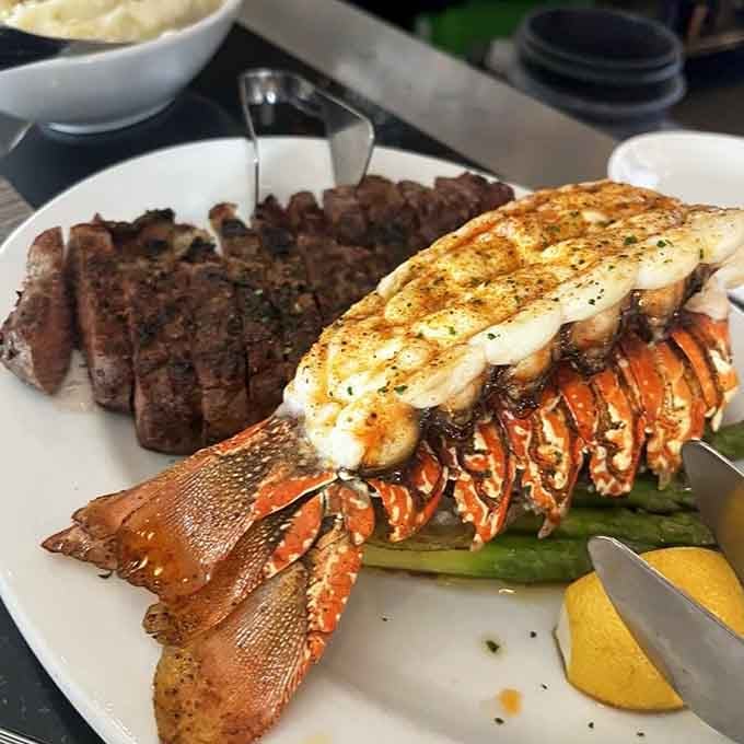 Surf and turf done right: that lobster tail and perfectly seared steak prove some combinations are classics for a reason.