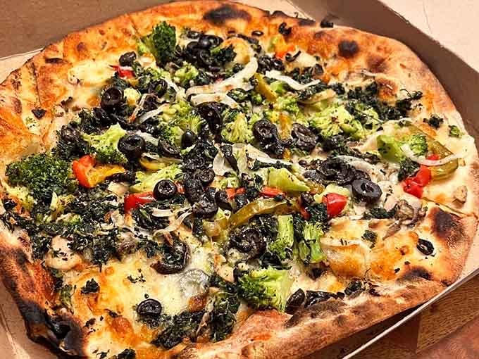 The Veggie Bomb proves vegetables on pizza can be just as exciting as any meat lover's dream.