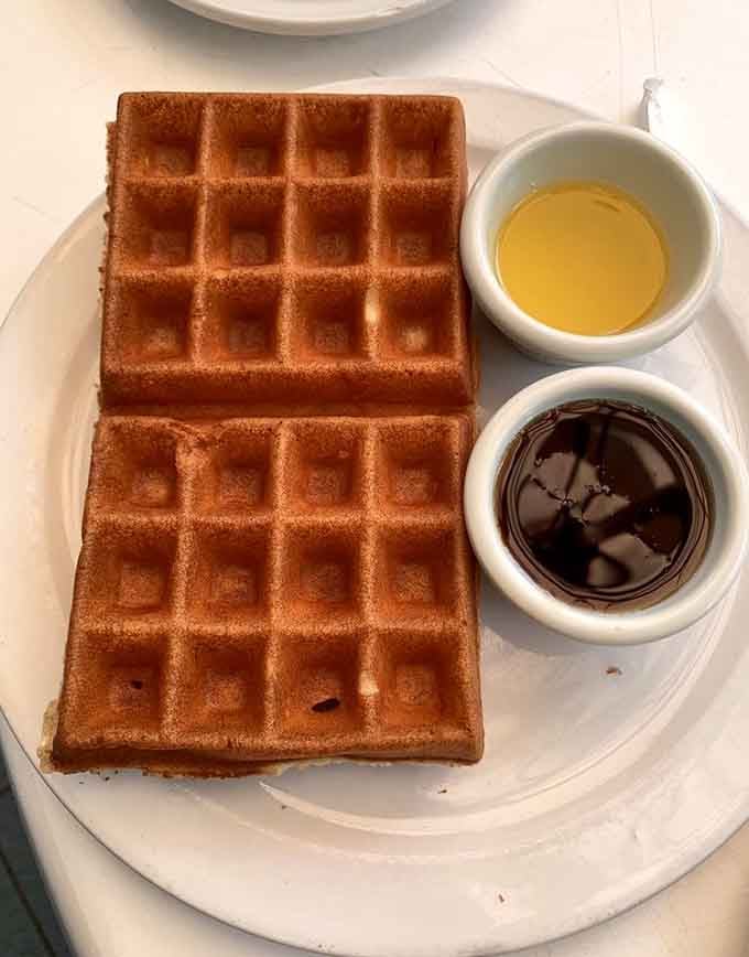 Two golden rectangles of pure Belgian perfection, served with butter and syrup like civilized people intended.