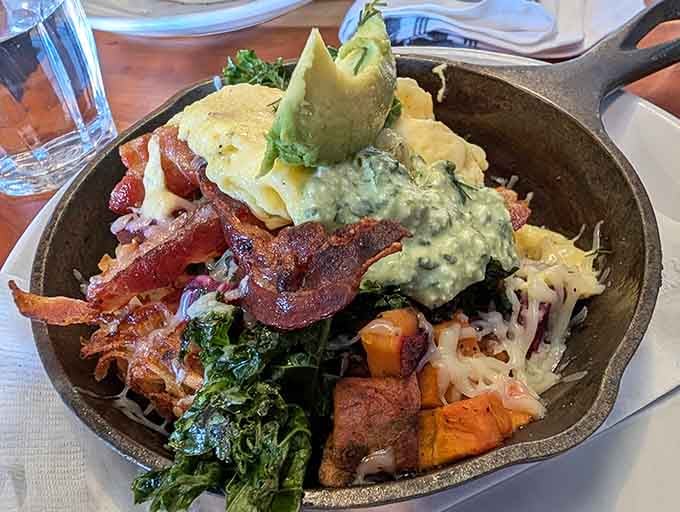 This skillet brings bacon, greens, and perfectly poached eggs together like a breakfast dream team in action.