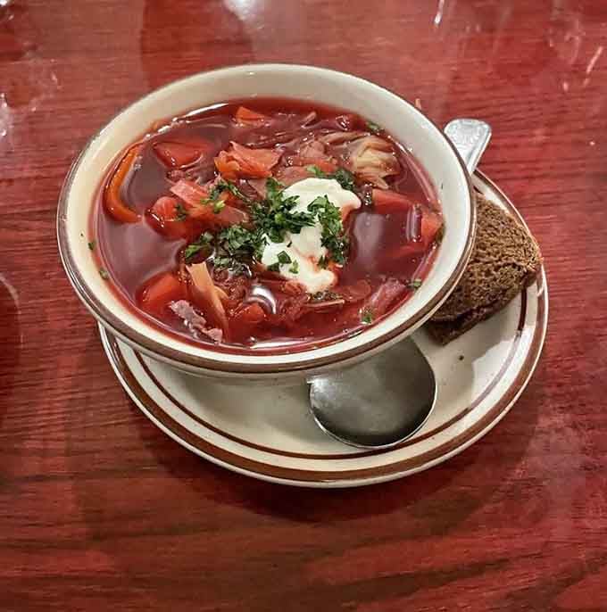Ruby-red borscht topped with sour cream: proof that beets can be beautiful, delicious, and Instagram-worthy all at once.