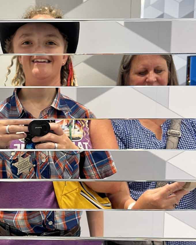 When mirrors slice reality into pieces, suddenly assembling yourself becomes the world's strangest jigsaw puzzle.