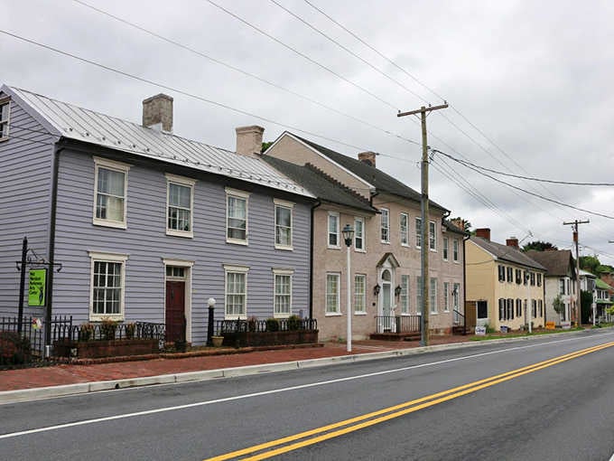 A rainbow of historic buildings painted in colors that would make any HOA absolutely lose their minds with delight.