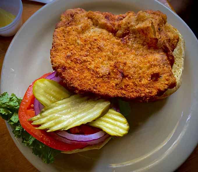That breaded tenderloin is bigger than your head and twice as satisfying, served with all the fixings you crave.