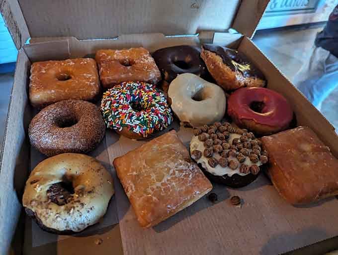 A dozen reasons to abandon your diet, each one handcrafted and calling your name from the box.