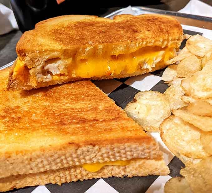 Behold the golden-griddled masterpiece that's causing all the fuss &ndash; melted cheese stretching like it's auditioning for a commercial.