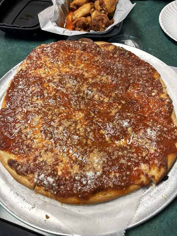 Look at that golden-brown perfection with its generous dusting of Romano cheese, like edible treasure waiting to be discovered.