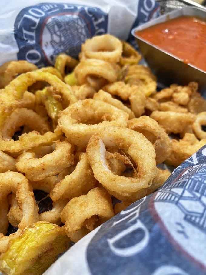 Golden calamari rings so perfectly crispy they could make a squid proud of its legacy on your plate.