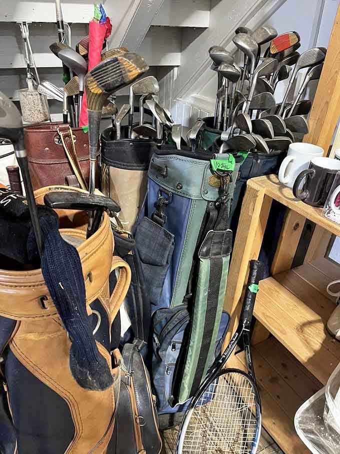 Golf clubs stand ready for their next eighteen holes, proving one person's garage clutter is another's treasure.