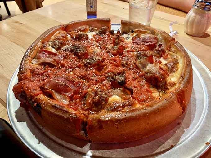 Behold the golden-crusted masterpiece that makes people plan road trips around lunch, loaded with perfectly seasoned sausage.