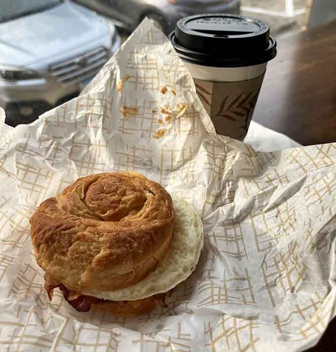 Flaky croissant layers embracing breakfast perfection, because some mornings demand the full buttery treatment you deserve.