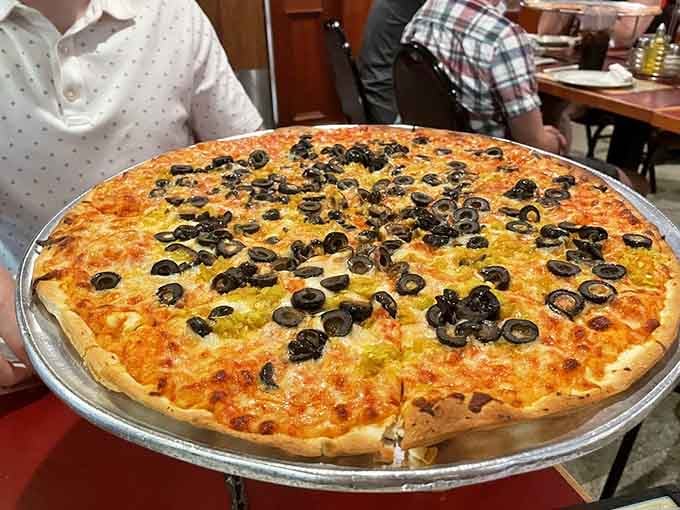 Behold the olive-topped masterpiece that could double as a small landing pad for very hungry helicopters everywhere.