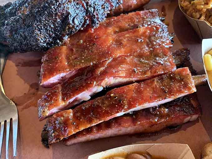 These pork ribs have the kind of glaze that catches light like edible amber, sticky and absolutely glorious.
