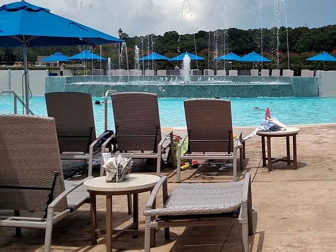 Pool loungers positioned for maximum relaxation, because doing absolutely nothing requires the perfect setup.