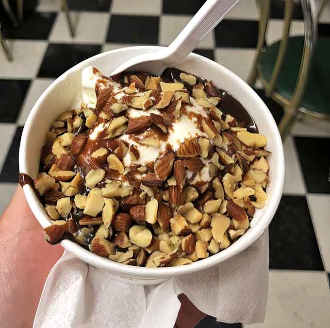 When your sundae needs its own architectural support system, you know you've ordered exactly the right amount of happiness.
