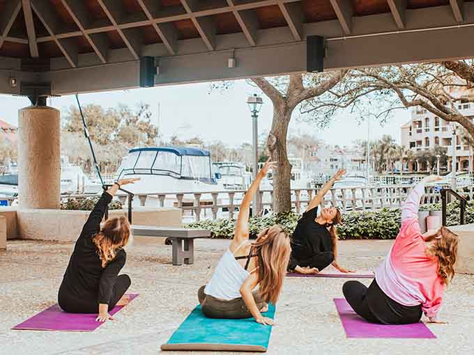 Waterfront yoga sessions prove that downward dog hits different when there's a marina view and sea breeze involved.
