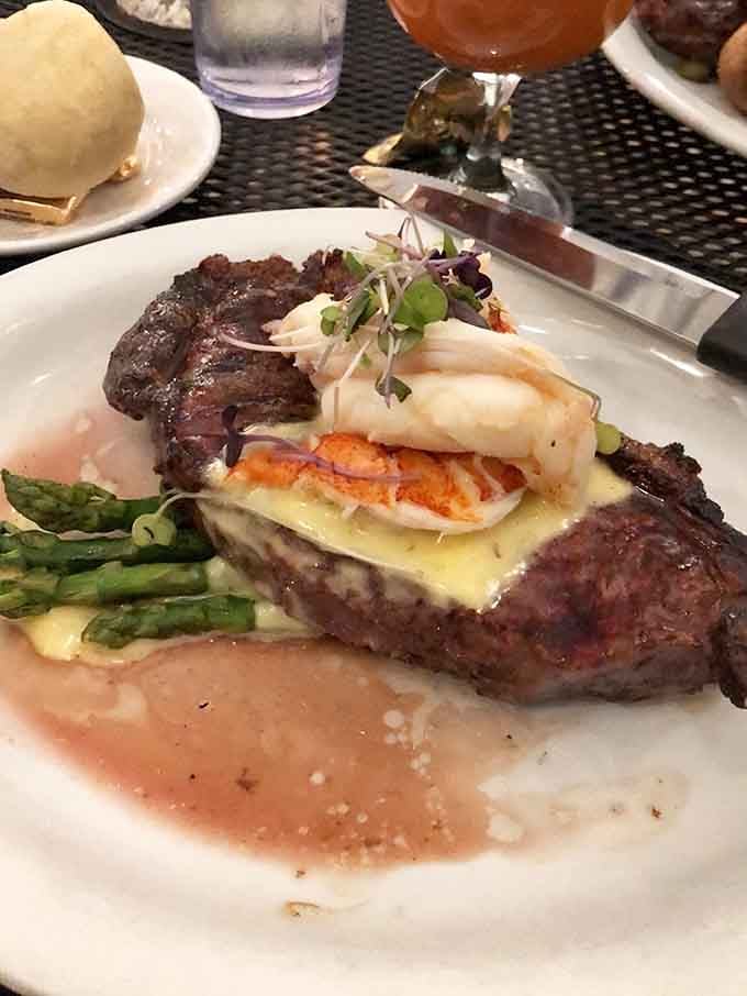 When steak meets lobster tail with asparagus on the side, you've found your happy place on a plate.