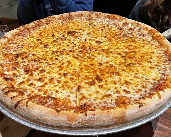Behold the golden standard: a cheese pizza so perfectly executed it needs no introduction or apologies.