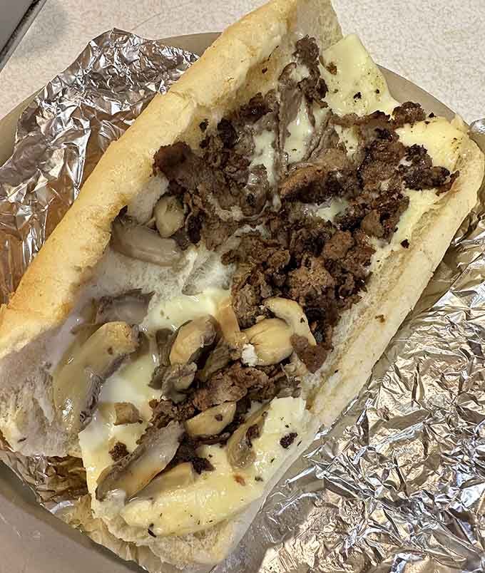 Behold the sandwich that launched a thousand road trips, wrapped in foil like the treasure it truly is.