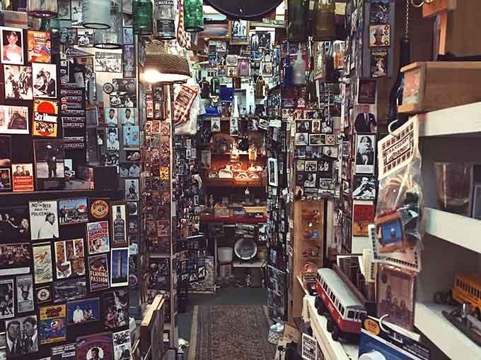 Floor-to-ceiling collectibles creating a museum where everything's actually for sale and touchable.