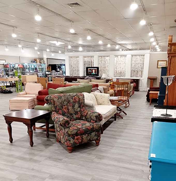 Furniture ranging from floral armchairs to sleek sofas, each piece waiting for its second act in someone's home.