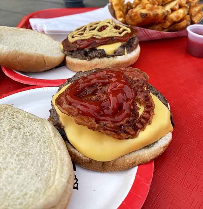 Behold the burger in its natural habitat: juicy, cheesy, and completely unapologetic about making your mouth water.