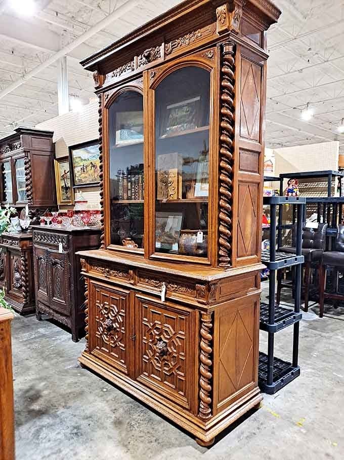 This ornate cabinet has more personality than most people, with carved details that scream "I belong in a castle."