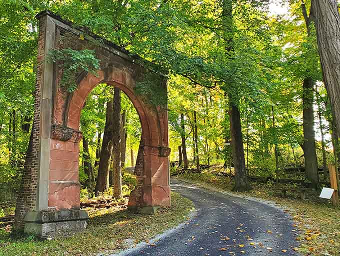 This weathered archway stands like a portal to another era, minus the time-traveling DeLorean but equally mysterious.