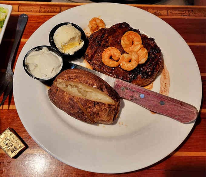 Blackened ribeye topped with shrimp because sometimes surf and turf is the only answer that makes sense in life.
