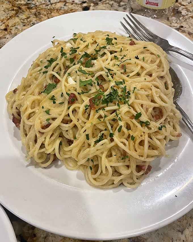 Perfectly twirled pasta topped with fresh herbs&mdash;this is what carb dreams are made of, folks.