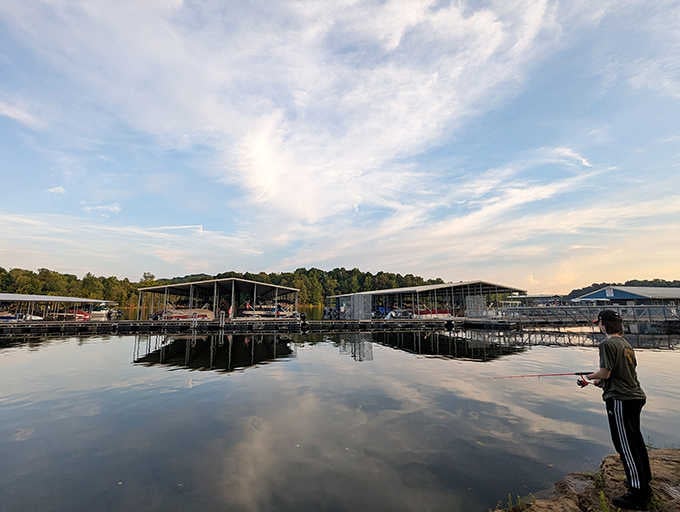 Glass-smooth water mirrors the sky so perfectly, you might forget which way is up in this tranquil scene.