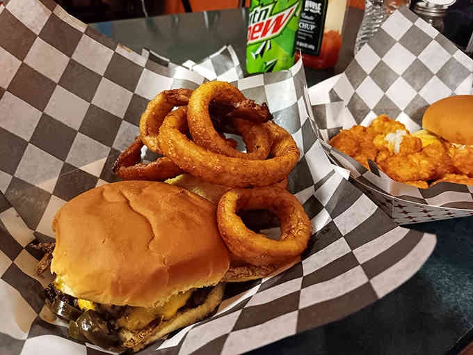 Behold the burger and onion rings combo that proves golden, crispy circles make everything better, especially when paired with melted cheese.