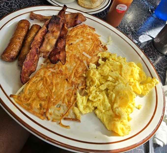 Golden hash browns, perfectly cooked eggs, and enough bacon to make your cardiologist schedule a meeting.