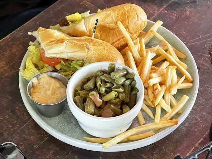 This po' boy comes loaded with all the fixings, proving that sometimes simple done right beats fancy every time.