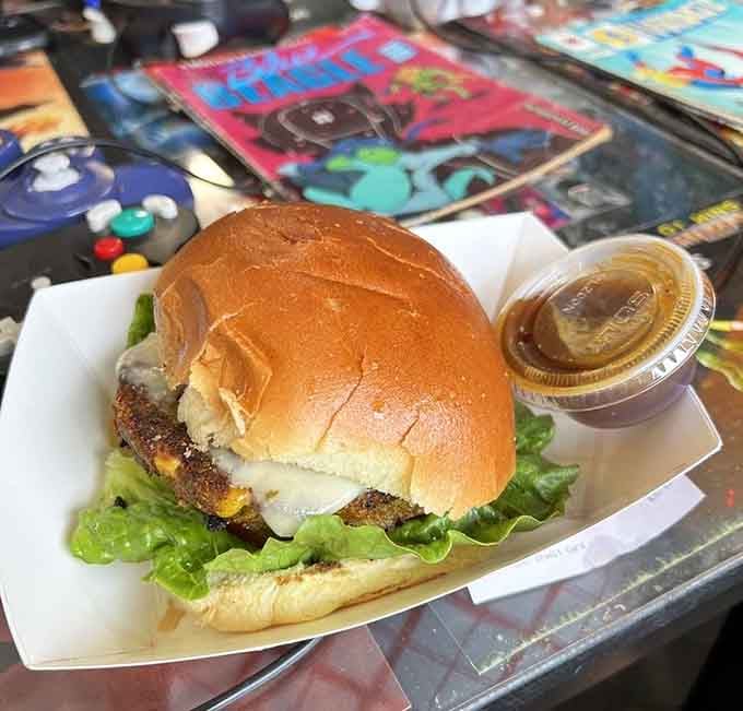 This veggie burger sits on a comic book table because even vegetables deserve a superhero origin story.