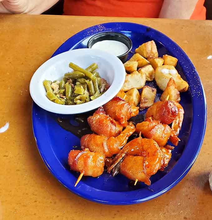 Those glistening bacon-wrapped beauties on skewers prove that everything really is better with bacon, especially award-winning shrimp.