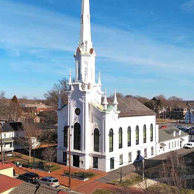 This stunning white church rises like a beacon, its soaring steeple a testament to Salem's enduring faith and craftsmanship.