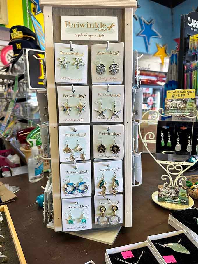Starfish and seahorse earrings displayed like tiny treasures waiting to add sparkle to someone's summer wardrobe.