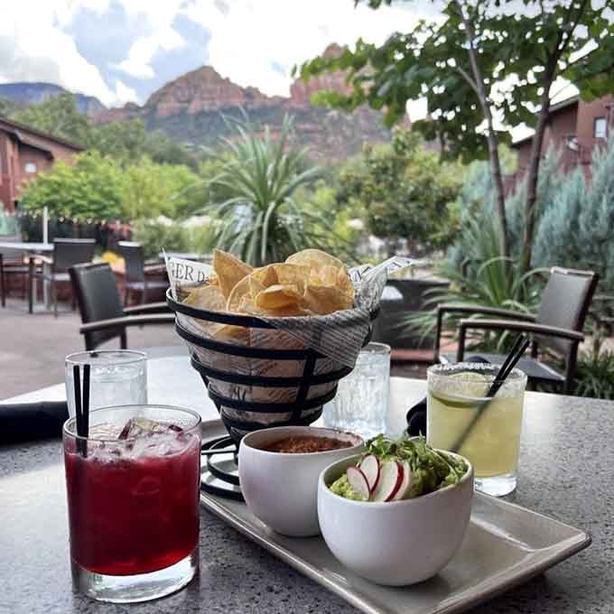 Chips, salsa, and a red rock backdrop that makes every appetizer feel like a celebration of being alive.