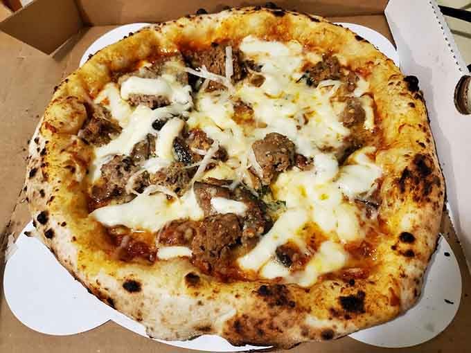 Perfectly charred crust with those signature leopard spots means you're about to experience pizza nirvana.