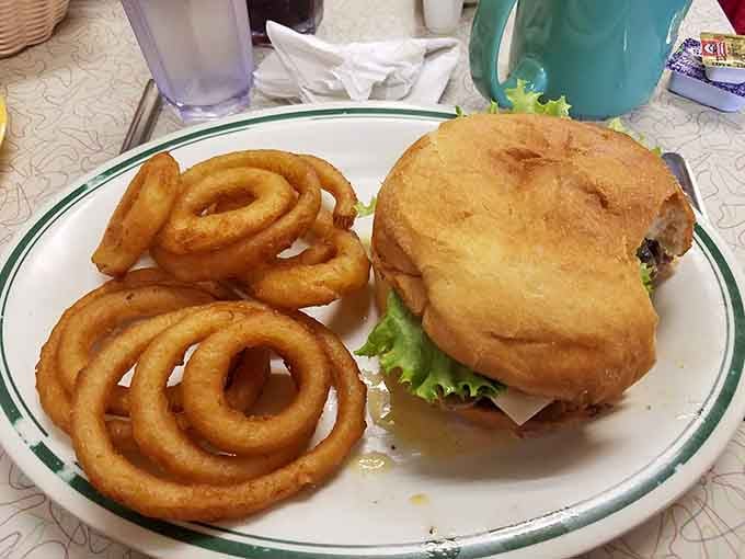 Golden onion rings and a burger that could make a vegetarian reconsider their life choices, just saying.
