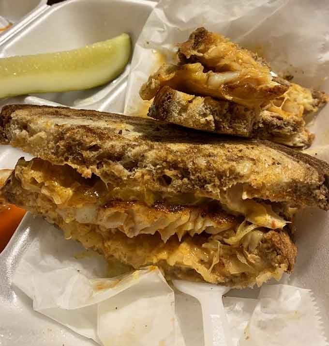 Behold the Reuben that'll make you forget every deli sandwich you've ever eaten, perfectly grilled and impossibly stacked.