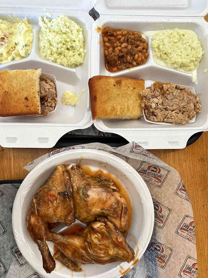 Whole hog barbecue, cornbread, slaw, and chicken that could make a vegetarian reconsider their life choices.