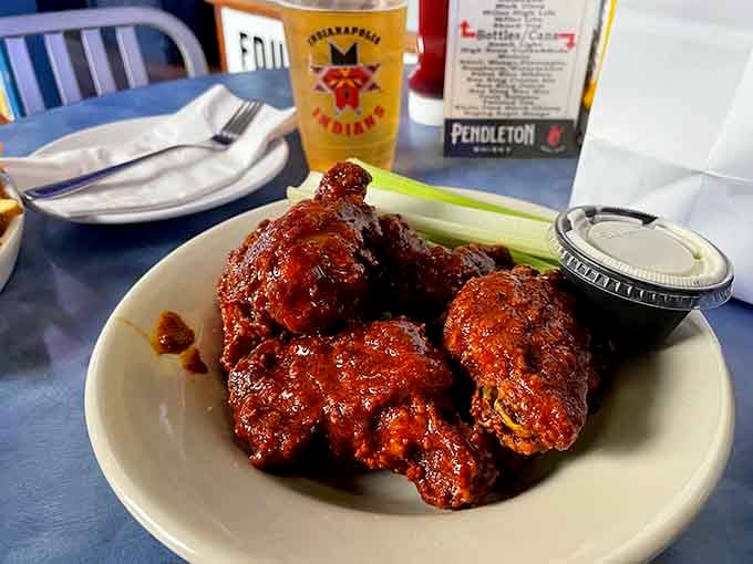 These wings wear their sauce like a badge of honor, glistening and ready to make your taste buds sing.