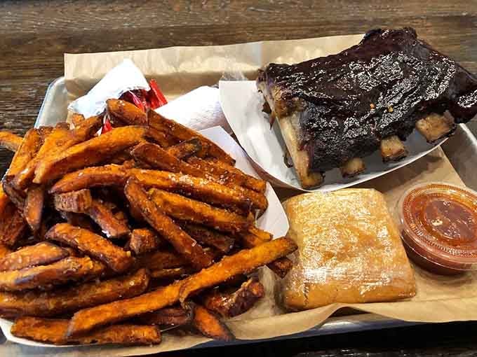 That dark, caramelized bark on those ribs tells you everything you need to know about what's coming next.