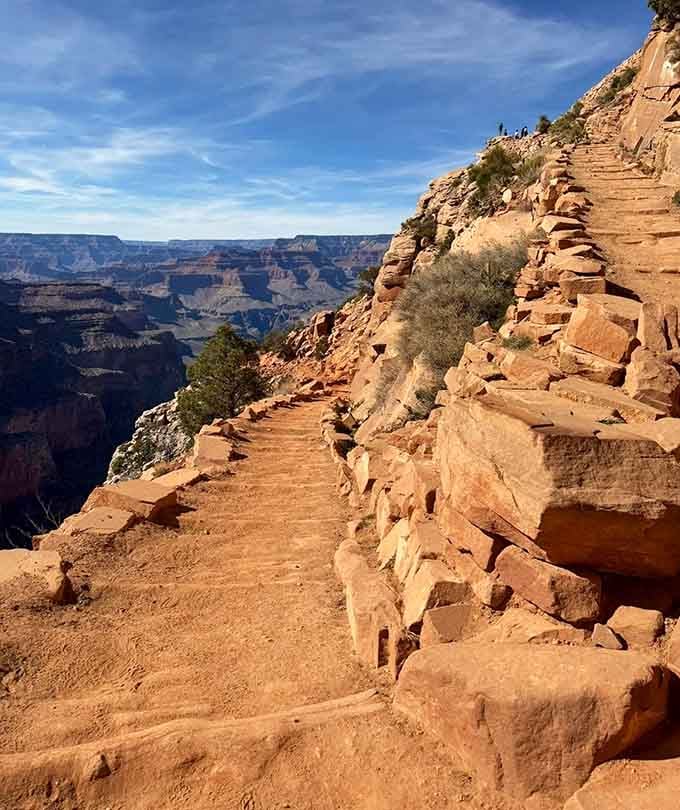 The switchbacks may test your knees, but every turn rewards you with views that make the descent absolutely worthwhile.