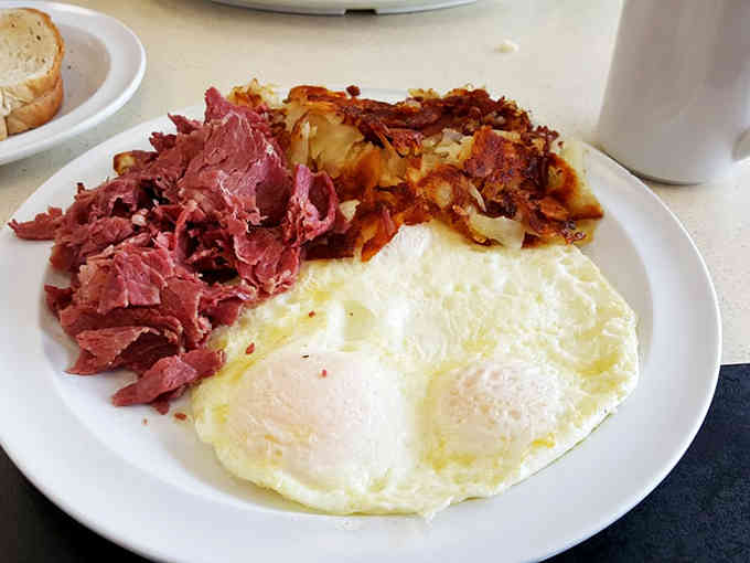Corned beef hash and perfectly cooked eggs prove that some combinations were simply meant to be together forever.