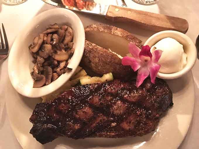 Strip steak, ribs, and sides that understand the assignment; this plate means serious business.