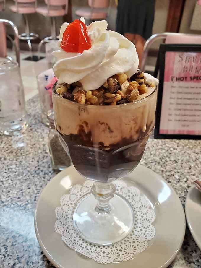 The Rocky Mountain Sundae towers like its namesake, complete with nuts, fudge, and zero regrets about calories.